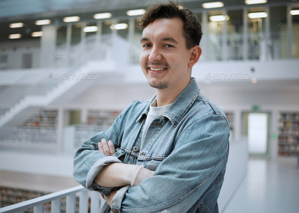College, knowledge and portrait of a man in a library for studying or ...