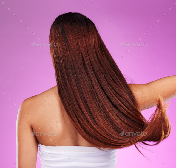 Back of woman, hair and color in studio with extension, beauty or salon ...