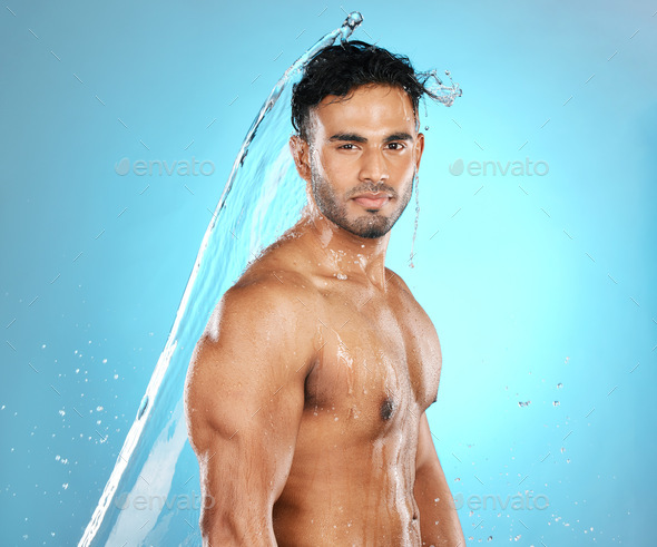 Water, splash and strong model for beauty, skin and skincare cleaning his body, muscle and ...