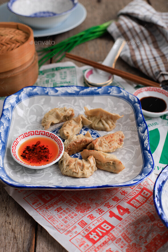 English Translation : Gyoza, Steamed and Grilled Dumpling Stuffed with ...