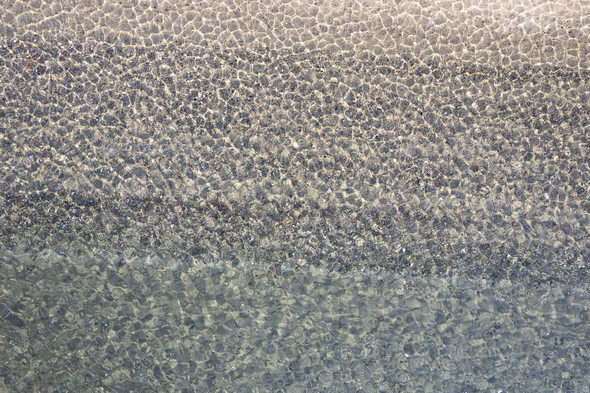 The transparency and shape of the sea waves Stock Photo by fotografiche