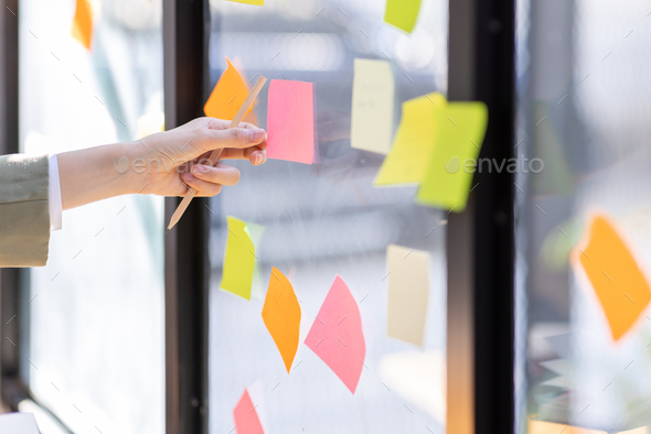 Business female employee with many conflicting priorities arranging ...