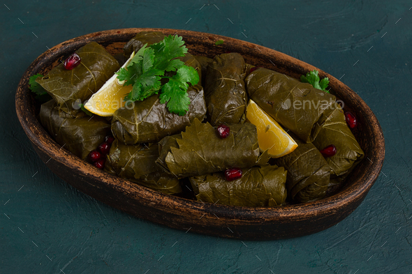 Dolma (Tolma) stuffed rolls, minced meat with rice, in grape leaves ...