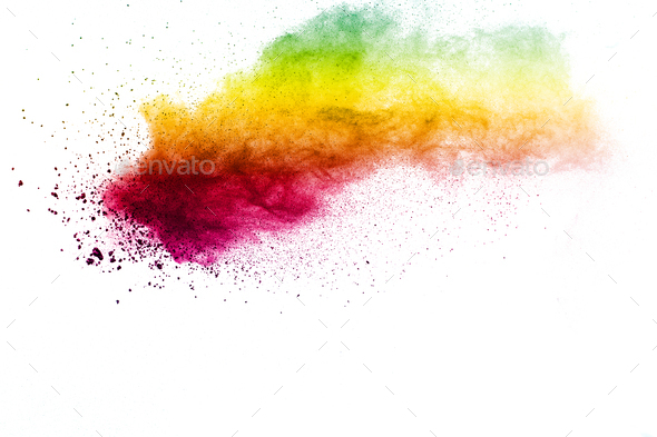 Red yellow and green dust particles explosion on white background ...