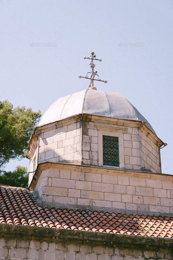 Dome of a brick church with a cross on the background of the sky Stock ...