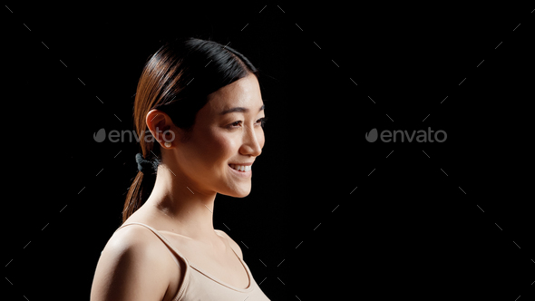 Asian girl with radiant bare skin posing for beauty ad Stock Photo by ...