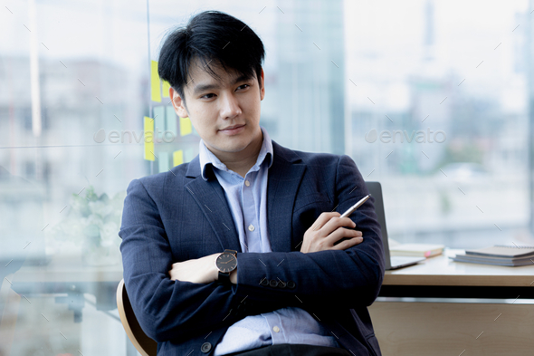 Asian man with suit, young businessman as startup company CEO ...
