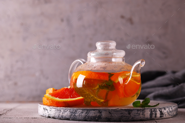 orange tea with mint in a glass teapot Stock Photo by Dream79 | PhotoDune