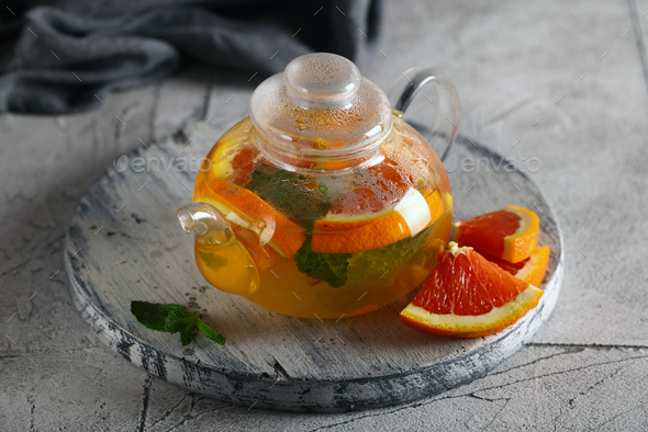 orange tea with mint in a glass teapot Stock Photo by Dream79 | PhotoDune