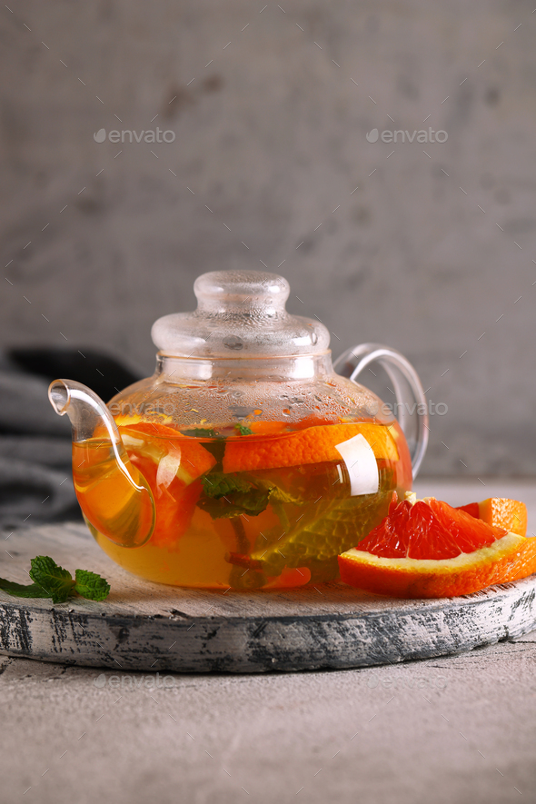 orange tea with mint in a glass teapot Stock Photo by Dream79 | PhotoDune