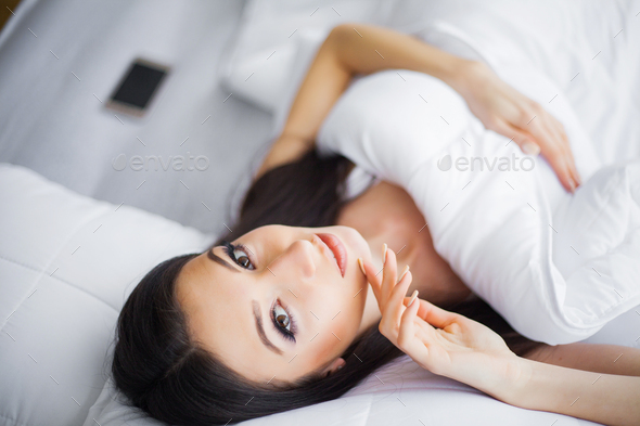 Good morning. Portrait of a smiling pretty young brunette woman ...