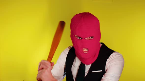 Man in Pink Balaclava with Baseball Bat, Stock Footage | VideoHive