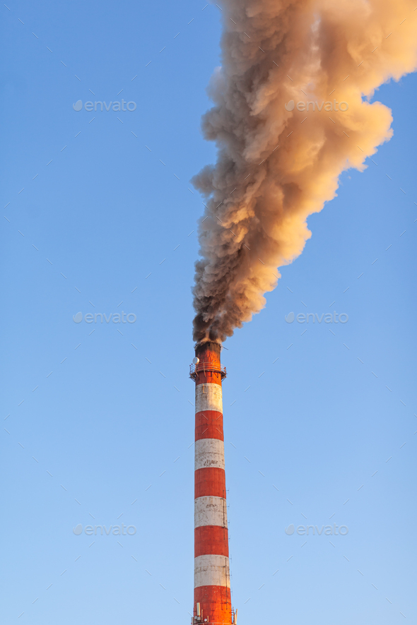 White thick smoke from the boiler room chimney. Industrial zone. Stock ...