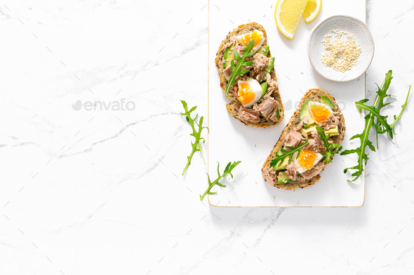 Tuna toast. Open sandwiches with whole grain bread, canned tuna, boiled ...
