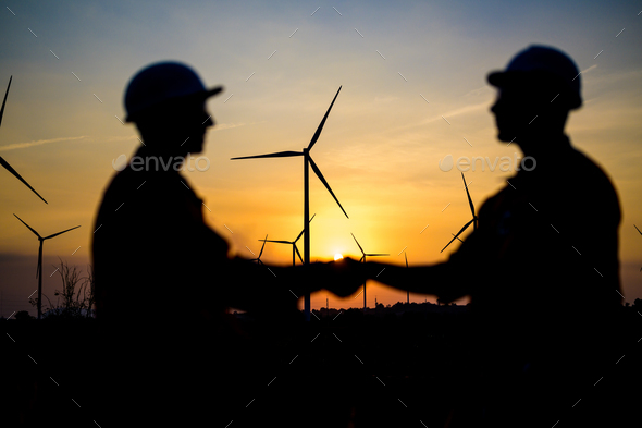 Renewable energy engineer working on wind turbine Stock Photo by 1footage