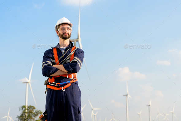 Renewable energy engineer working on wind turbine Stock Photo by 1footage