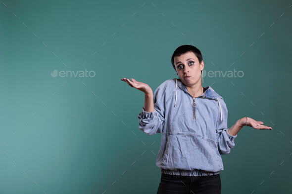 Portrait of confused model with gorgeous makeup posing on isolated ...