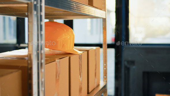 Racks and shelves filled with packages in storage room Stock Photo by ...