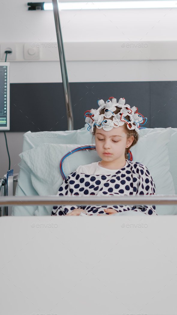 Pediatrician woman doctor monitoring sickness evolution while analyzing ...