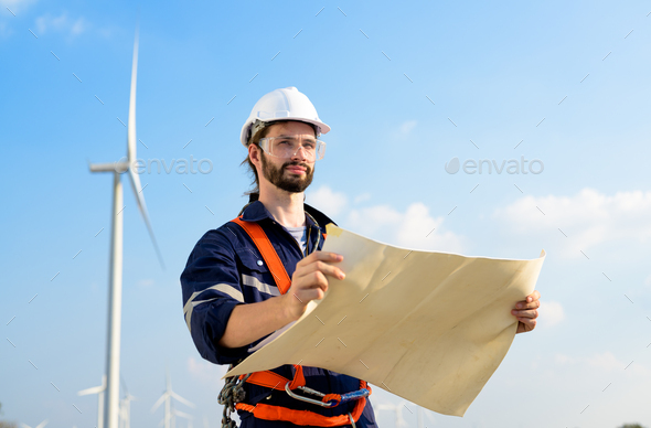 Renewable energy engineer working on wind turbine Stock Photo by 1footage