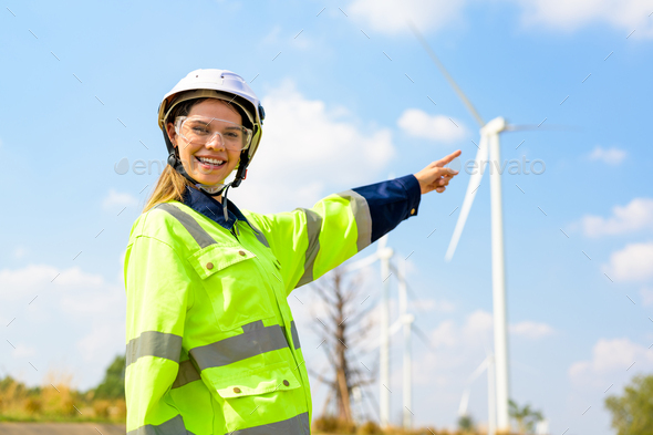 Renewable energy engineer working on wind turbine Stock Photo by 1footage