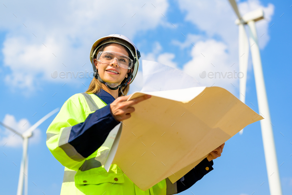 Renewable energy engineer working on wind turbine Stock Photo by 1footage