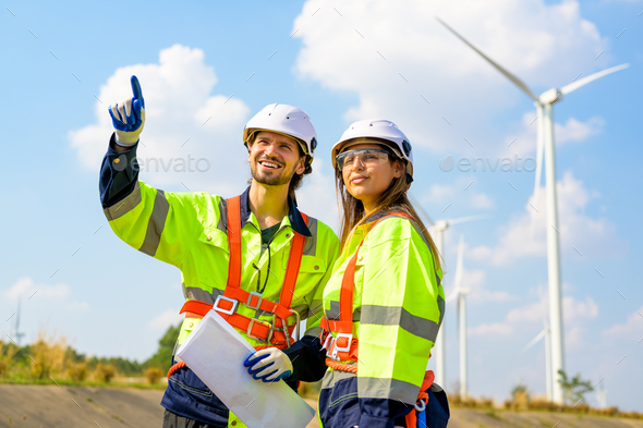 Renewable energy engineer working on wind turbine Stock Photo by 1footage
