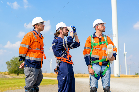 Renewable energy engineer working on wind turbine Stock Photo by 1footage