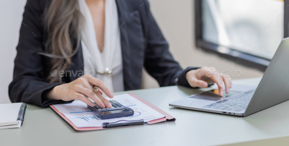 portrait of business Asian woman Accounting using calculating income ...