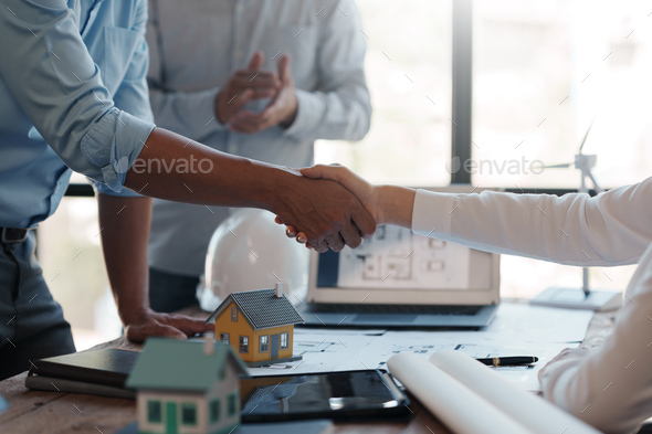 Architects and engineers work together and hand in hand to work towards ...