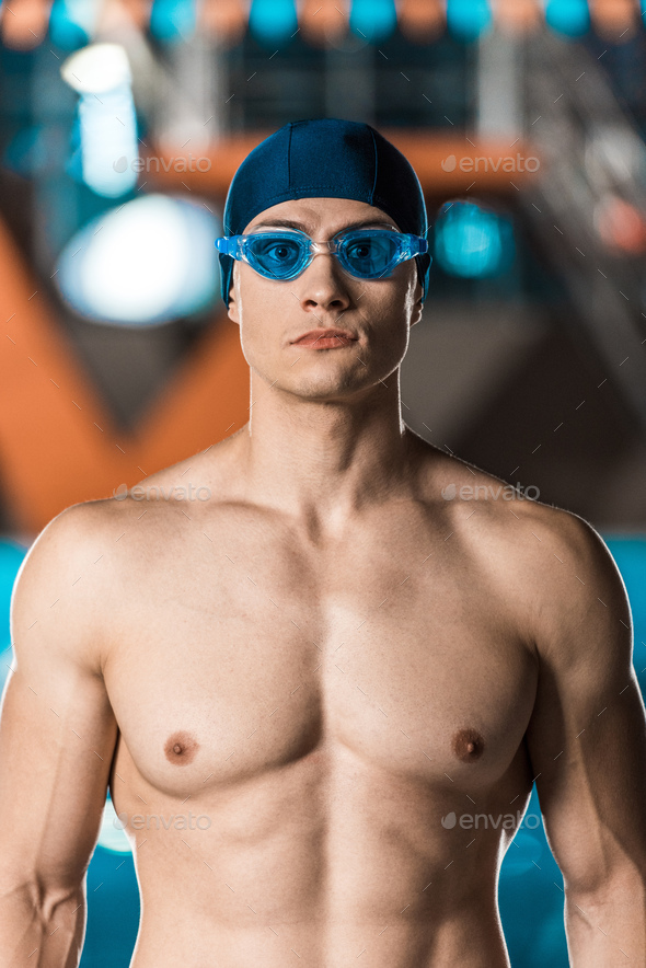 handsome muscular swimmer in swimming cap and goggles Stock Photo by ...