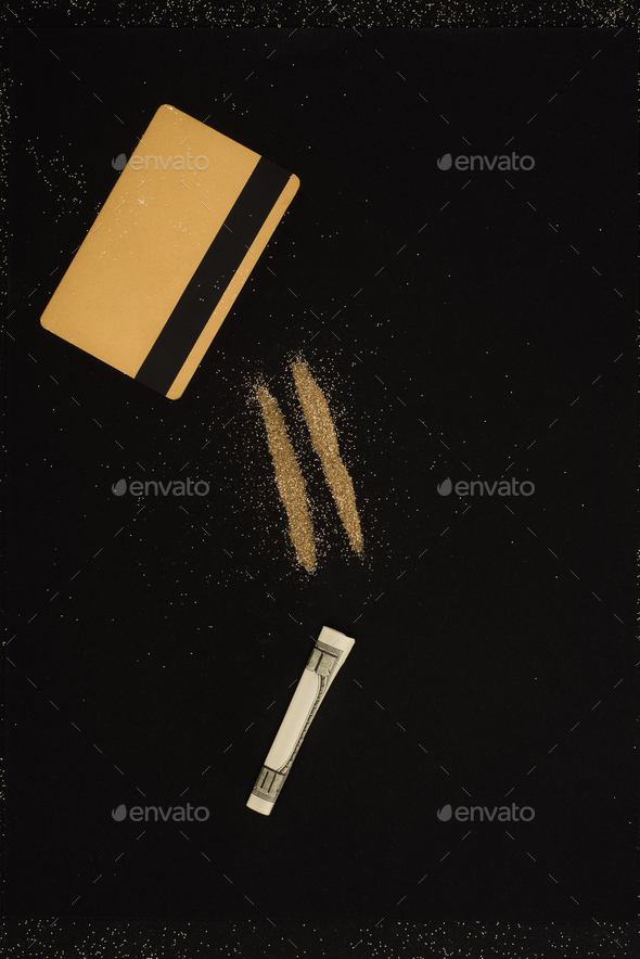 top view of golden credit card, dollar and powder lines isolated on ...