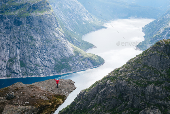 Trolltunga Rock and Ringedalsvatnet lake in Norway Stock Photo by Kotenko