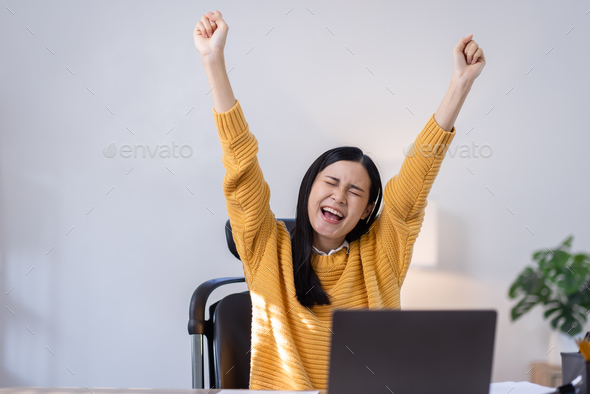 Enthusiastic asian woman rejoicing, excited, say yes, individual ...