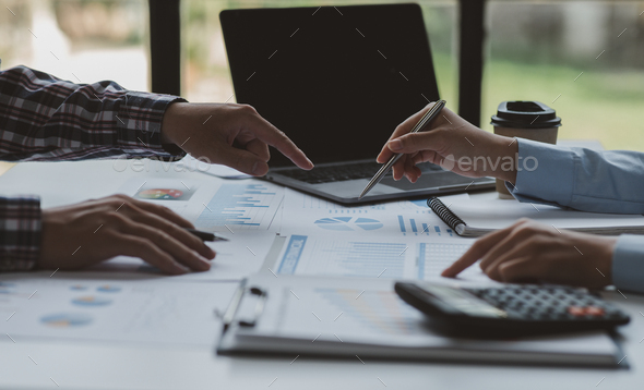 Team of business people working together in the meeting room office ...