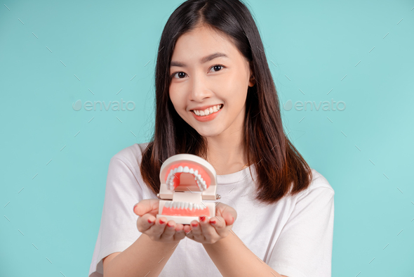 Dental of asian woman with tooth sample and white teeth increase ...