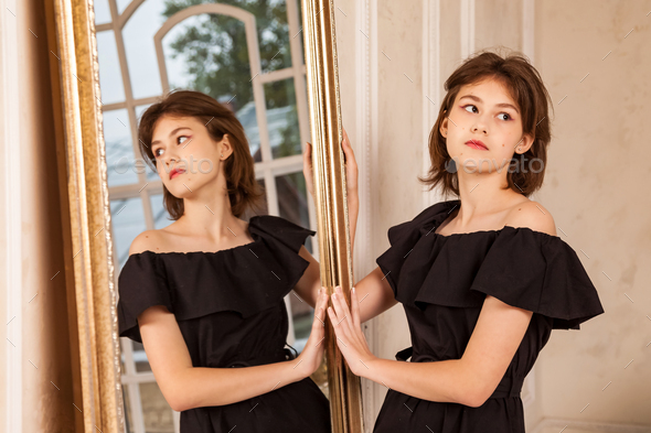 Portrait teenager caucasian girl 15 year old posing and looking away ...