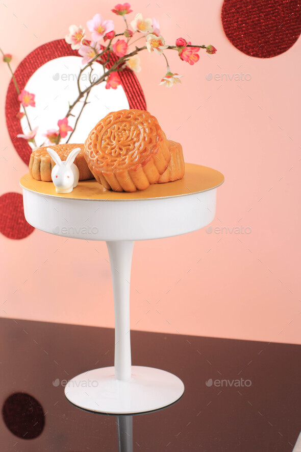 Mooncake on Light Pink Background with Pink Flower. Concept Moon Cake ...