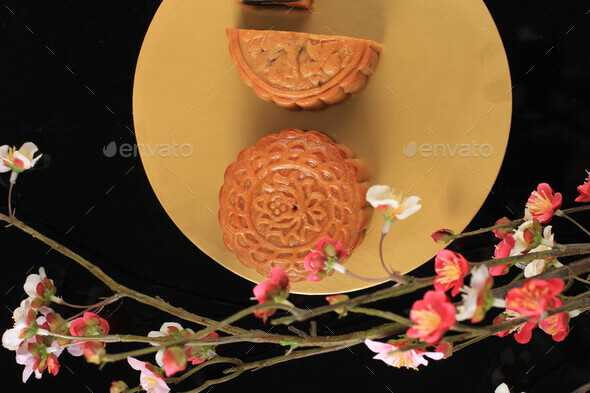 Mooncake on Light Pink Background with Pink Flower. Concept Moon Cake ...