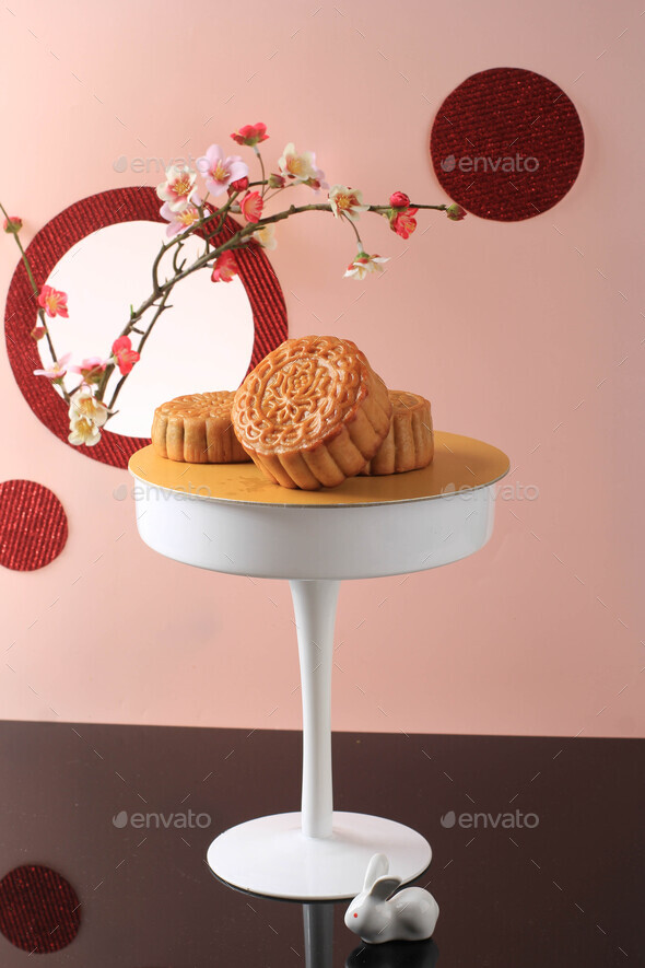 Mooncake on Light Pink Background with Pink Flower. Concept Moon Cake ...