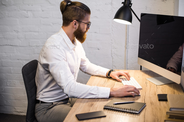 businessman typing something on keyboard in office Stock Photo by ...