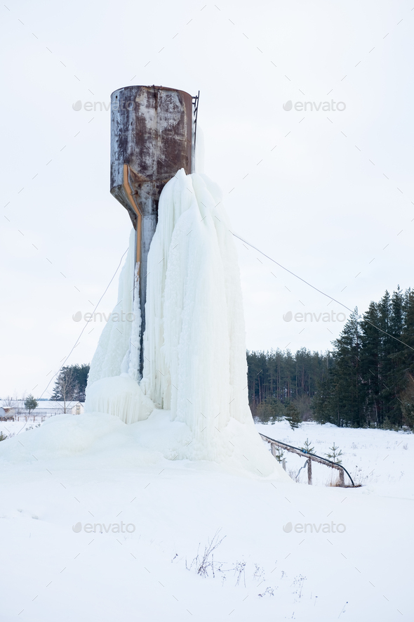frozen water tower. The water turned to ice. Abnormal cold Stock Photo ...