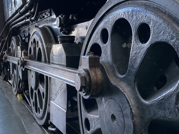 Drive wheels on a steam locomotive Stock Photo by SteveAllenPhoto999