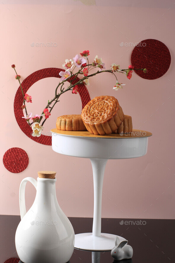 Mooncake on Light Pink Background with Pink Flower. Concept Moon Cake ...