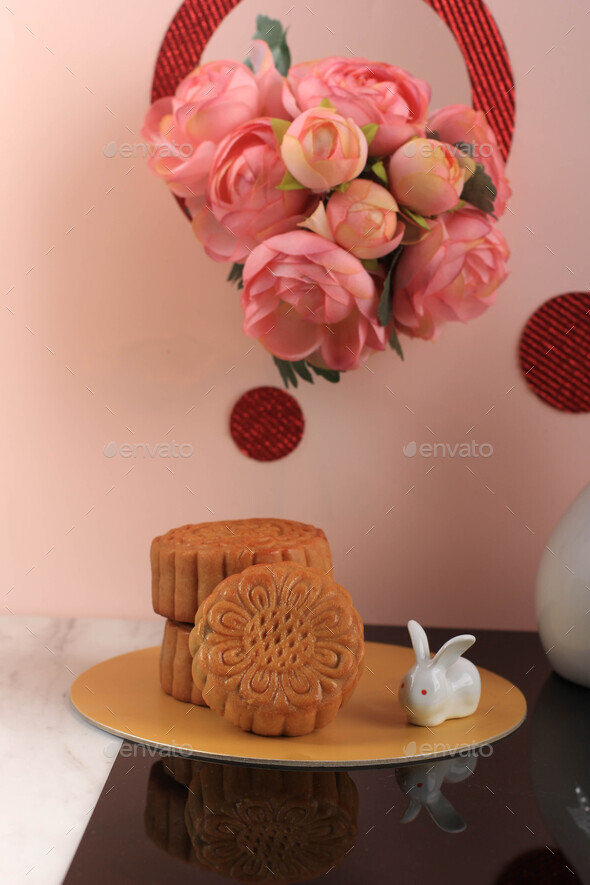 Mooncake on Light Pink Background with Pink Flower. Concept Moon Cake ...