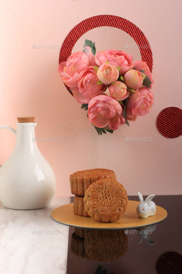 Mooncake on Light Pink Background with Pink Flower. Concept Moon Cake ...