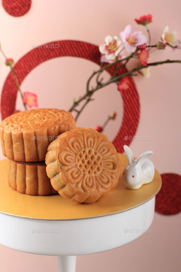 Mooncake on Light Pink Background with Pink Flower. Concept Moon Cake ...