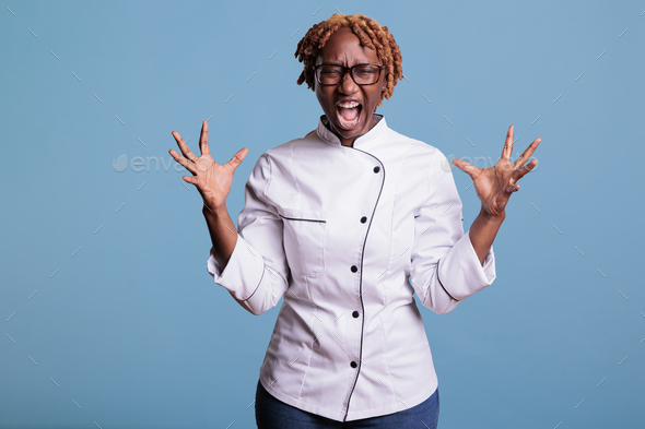 Angry african american female chef screaming loudly Stock Photo by DC ...
