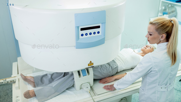 Knee MRI scan procedure in the hospital. Stock Photo by drazenphoto