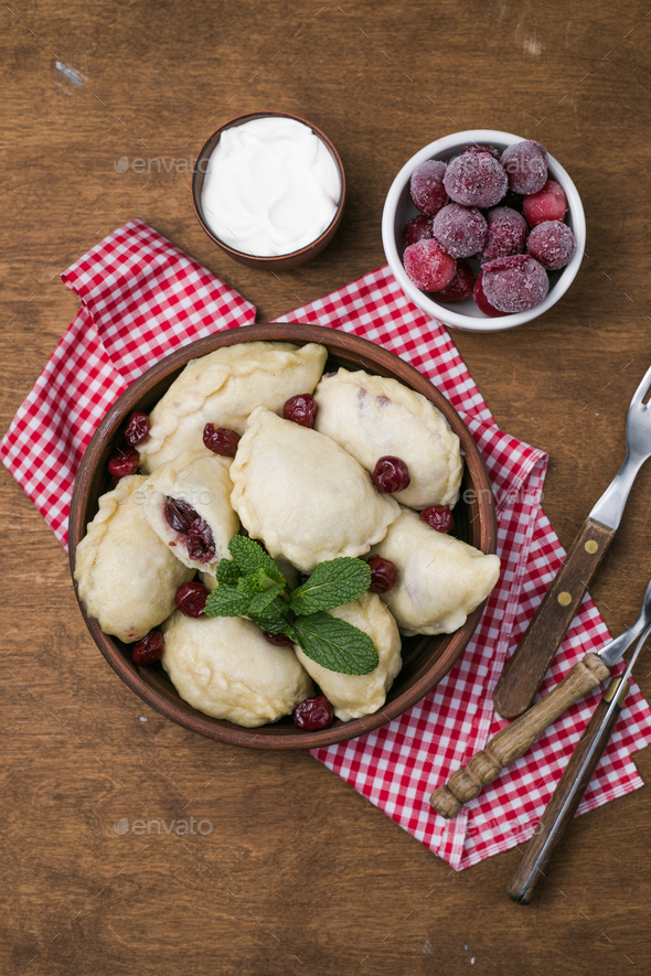 Pierogi with cherries. Vareniki dumplings. Traditional Ukrainian food ...